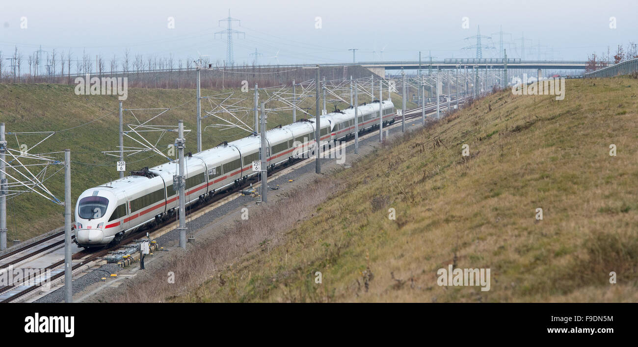 An ICE-T 1557 train from the Deutsche Bahn AG (DB) rides through the ...