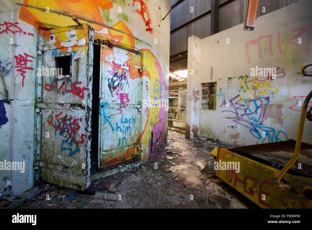 Old and dirty vandalised abandoned mill Stock Photo - Alamy