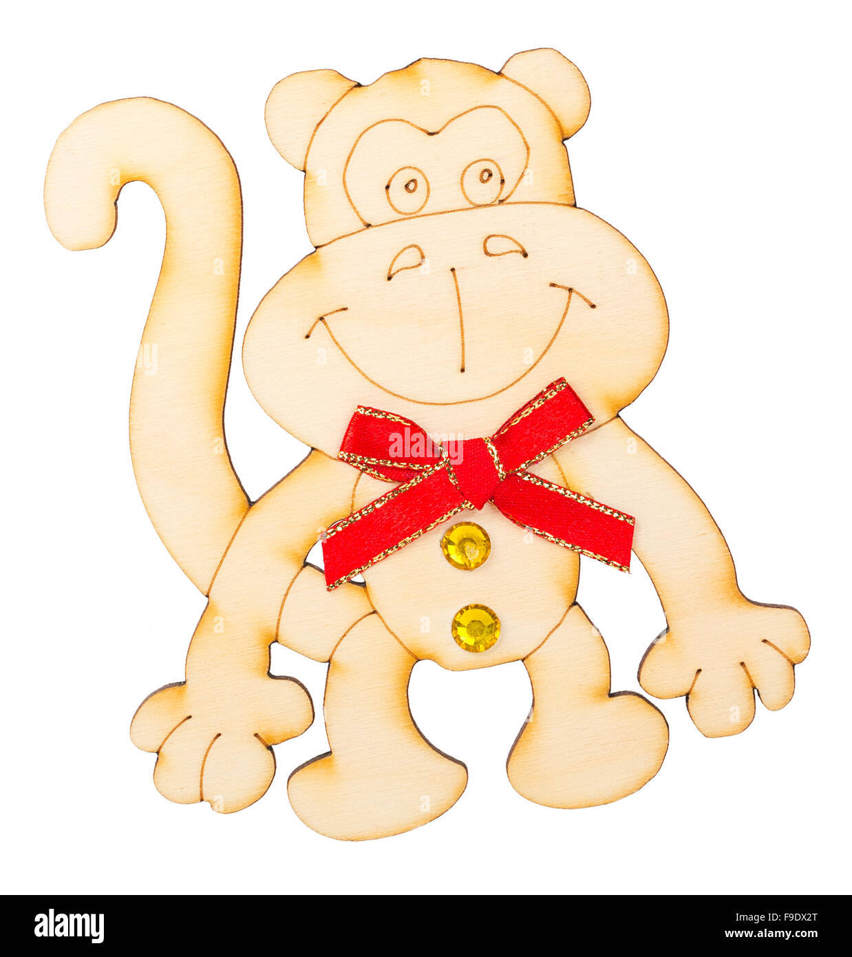 wooden shape in the form of a monkey with a red butterfly decoration ...