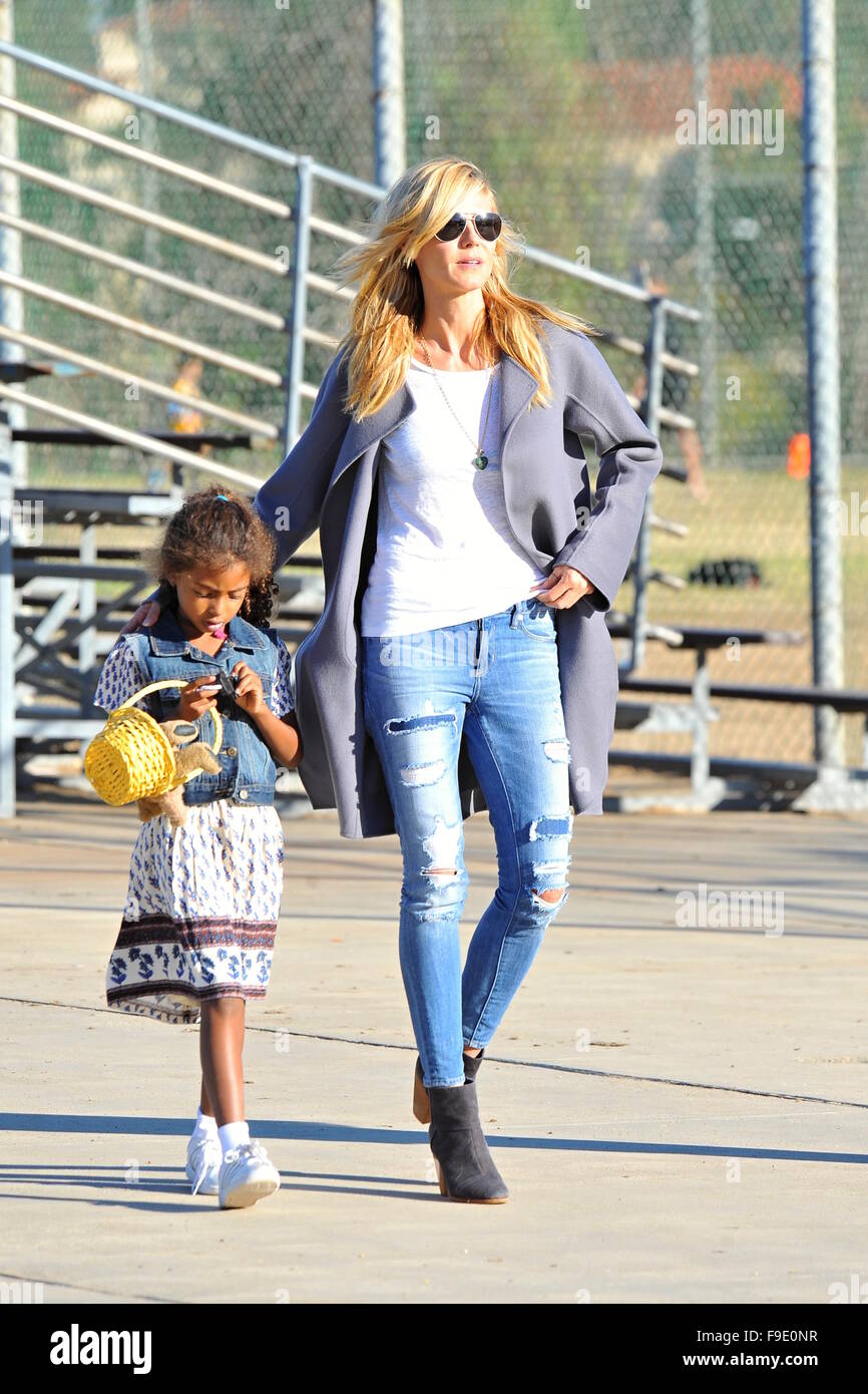 Heidi Klum and Seal watch their children play in a soccer match in ...