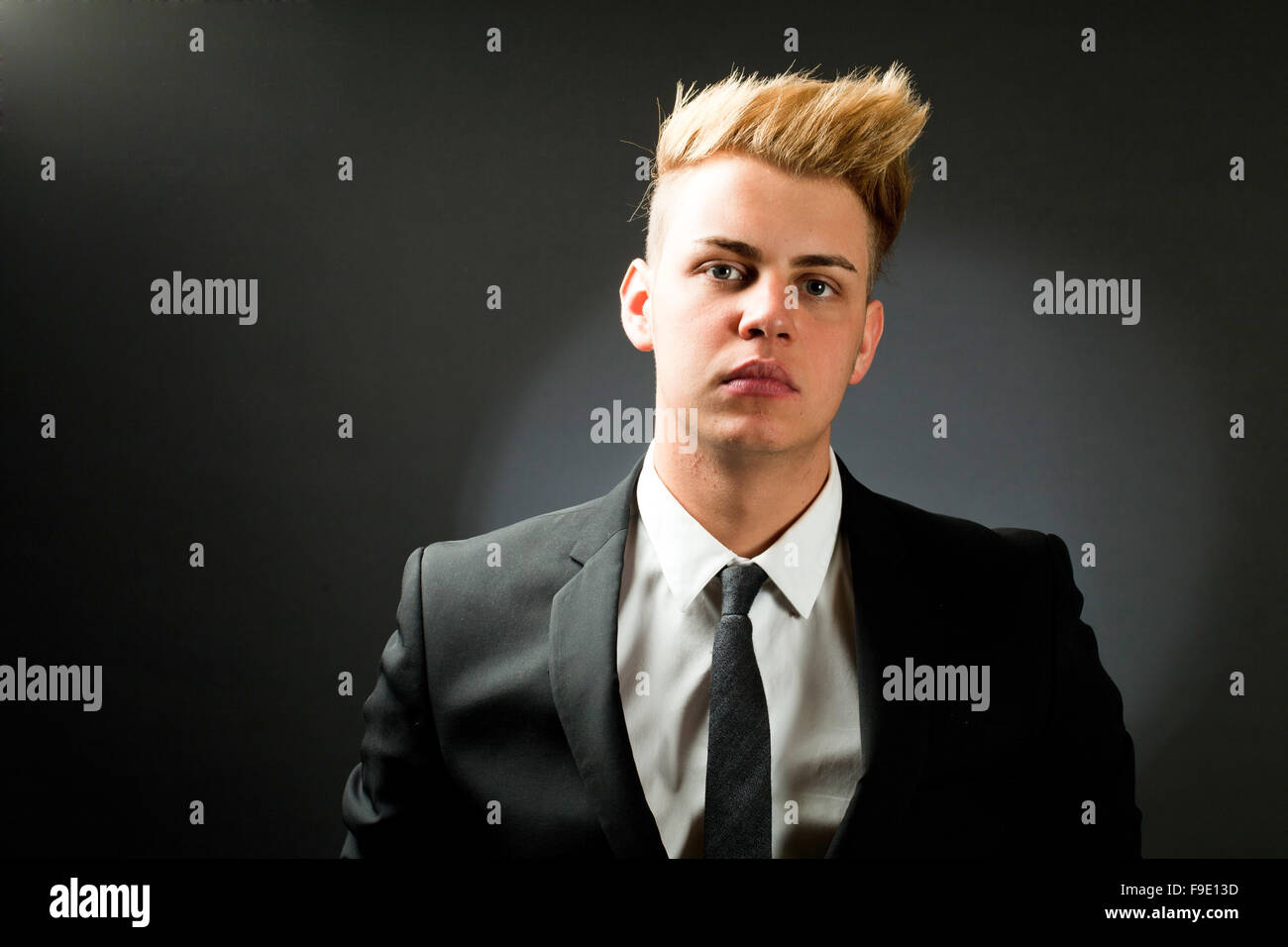 male model posing in the studio Stock Photo - Alamy