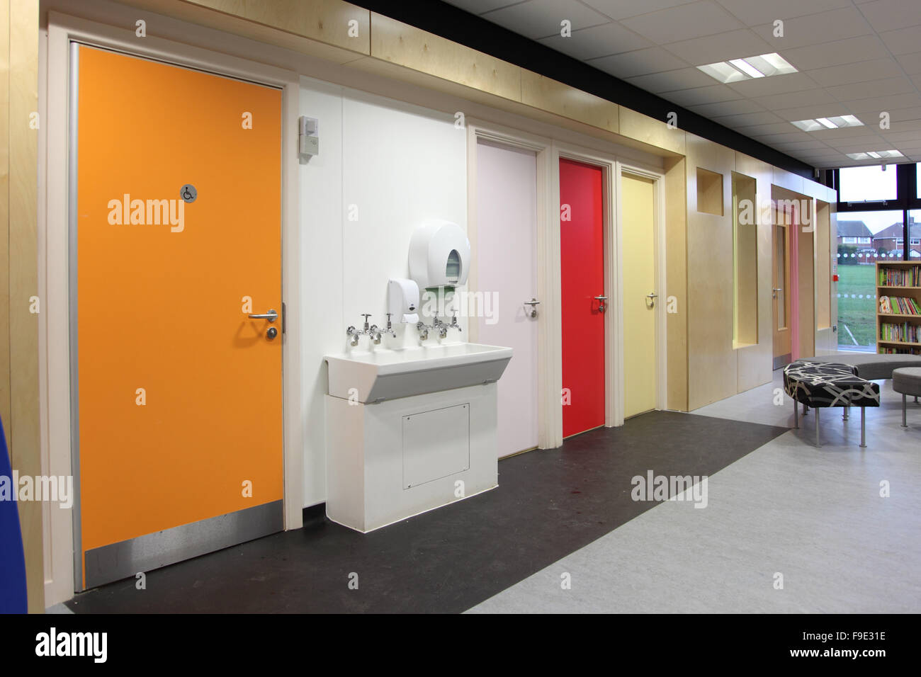 wet area in a modern, UK primary school. Shows basin outside a disabled ...
