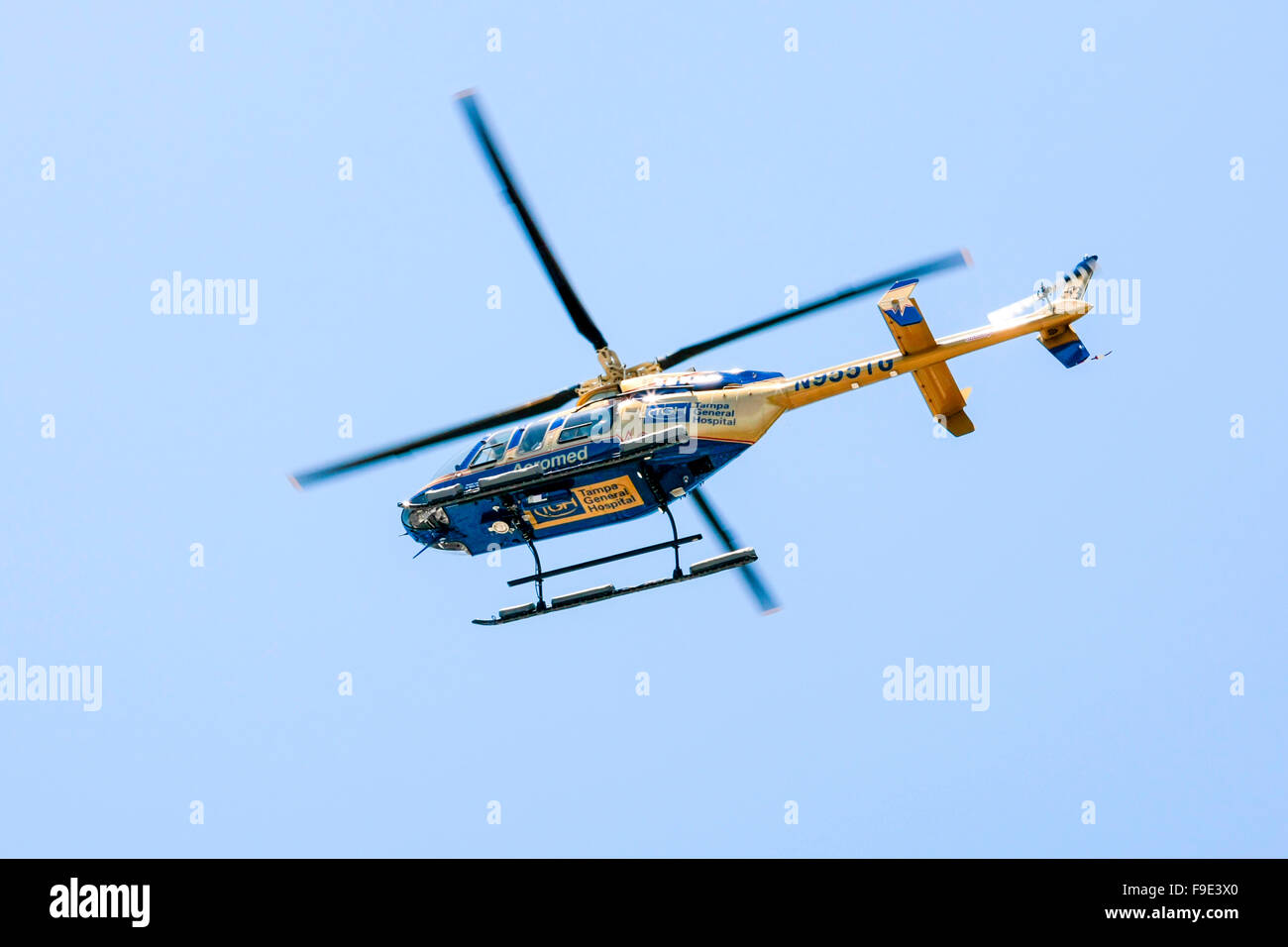 Close up of a medivac bell Jet Ranger helicopter in the skies over ...
