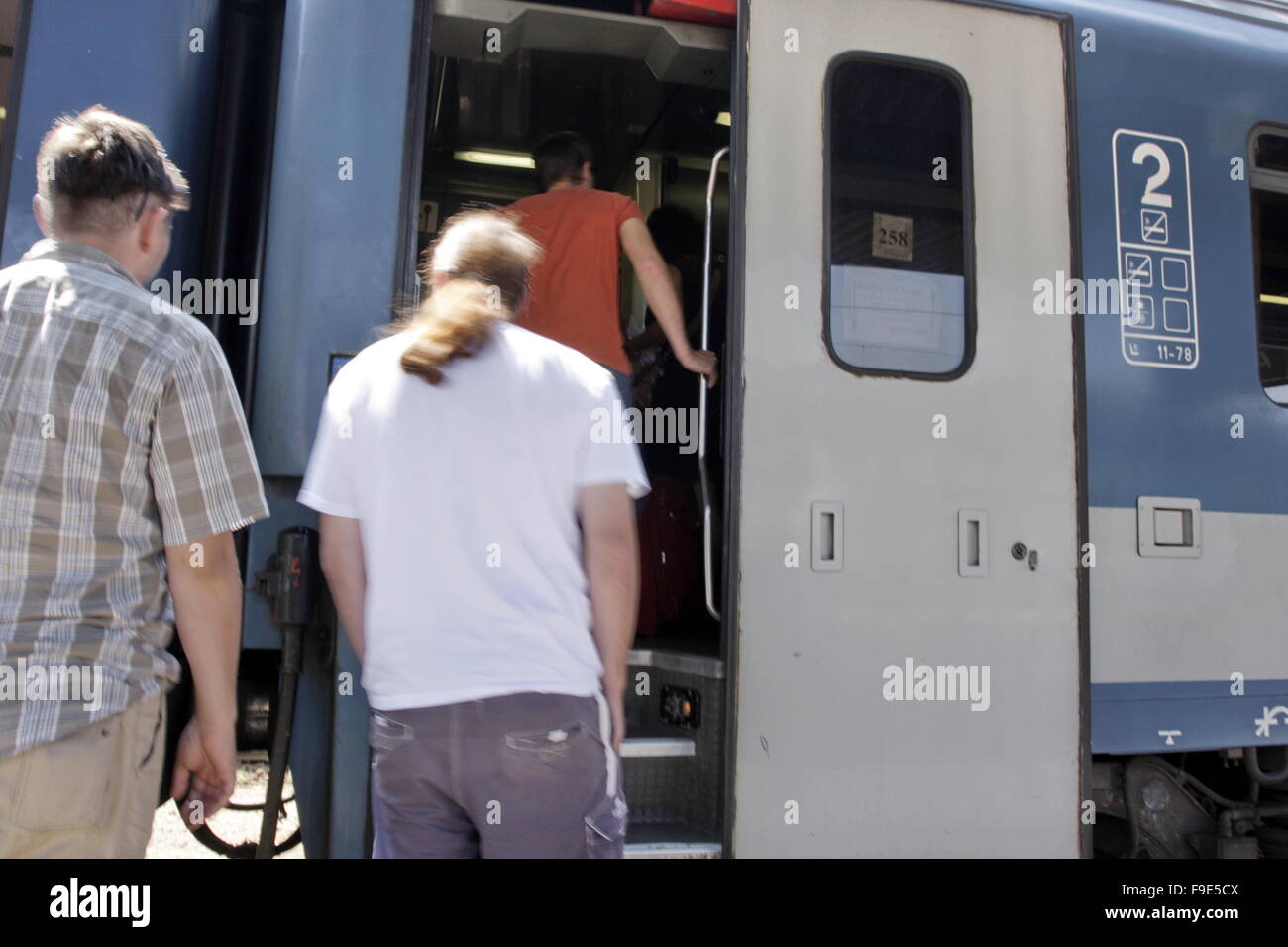 People entering hi-res stock photography and images - Alamy