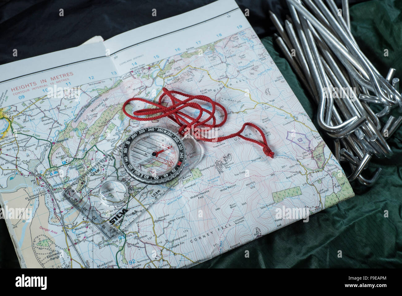 Map and compass Stock Photo - Alamy