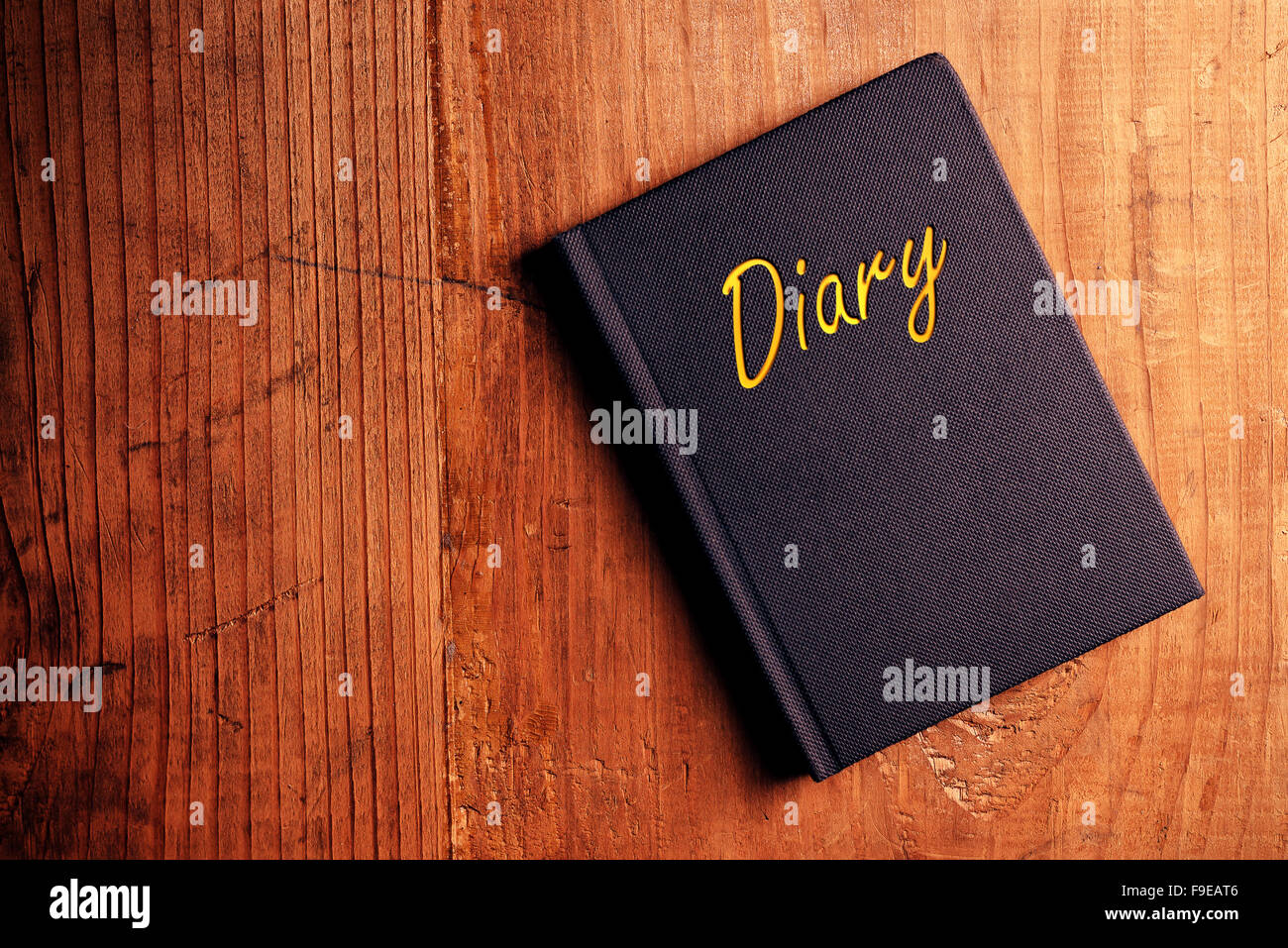 Diary notebook at the desk, retro toned, top view studio shot Stock ...