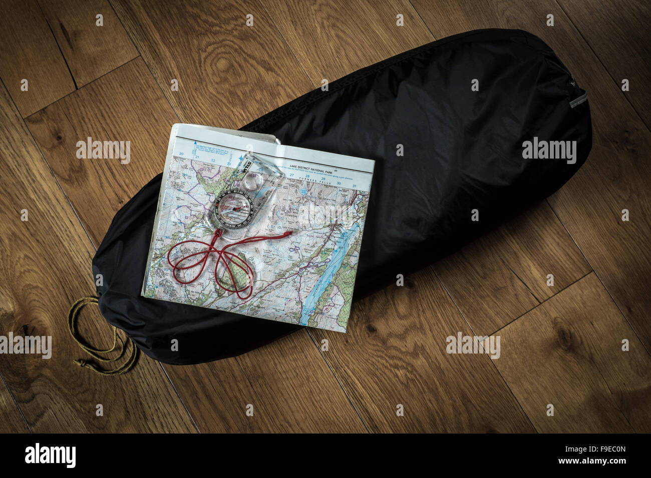 Map, compass and tent Stock Photo - Alamy