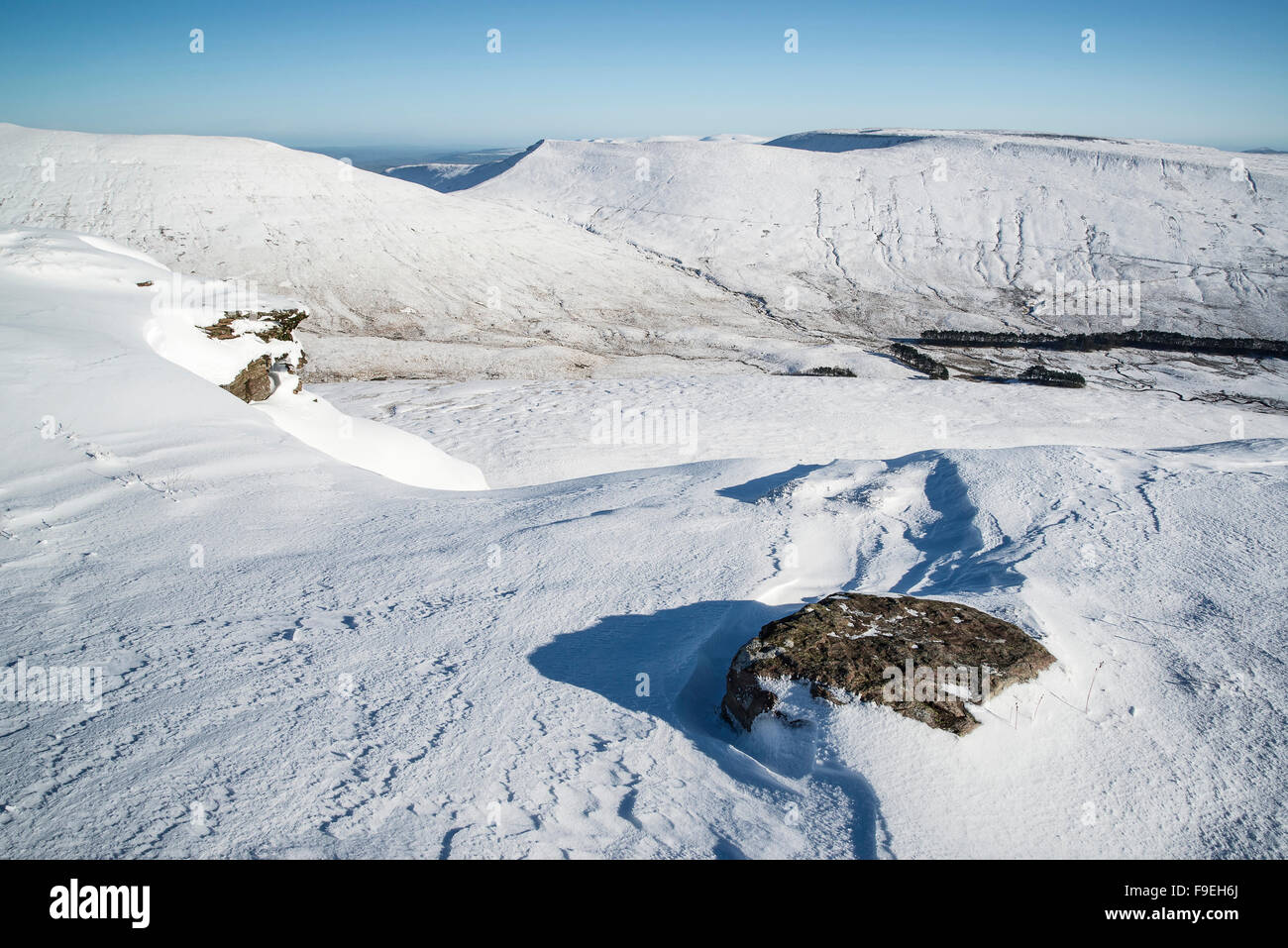 Stunning landscape views from top of deep snow covered mountains in ...