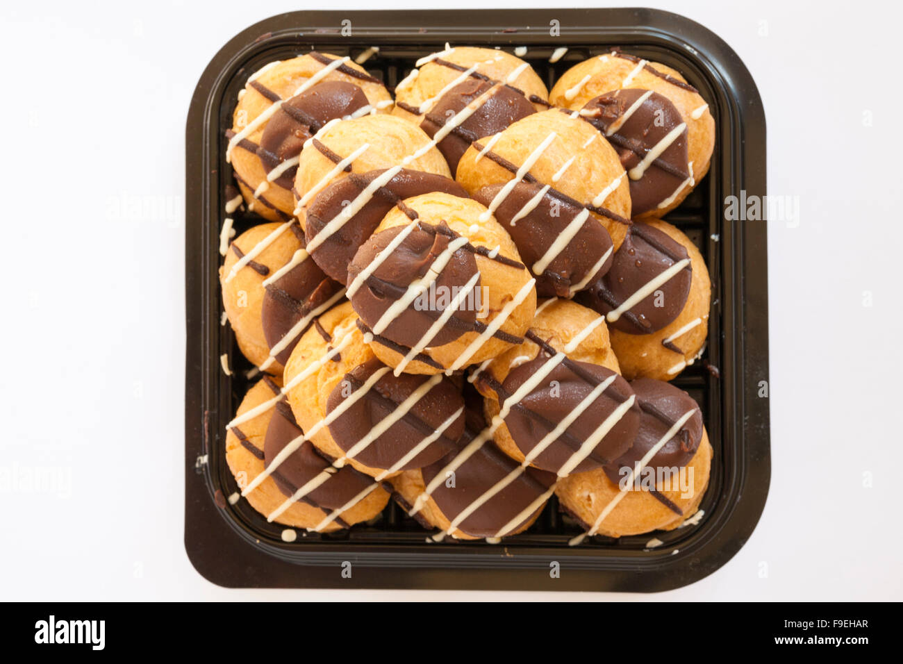 Marks & Spencer profiterole stack dessert isolated on white background ...