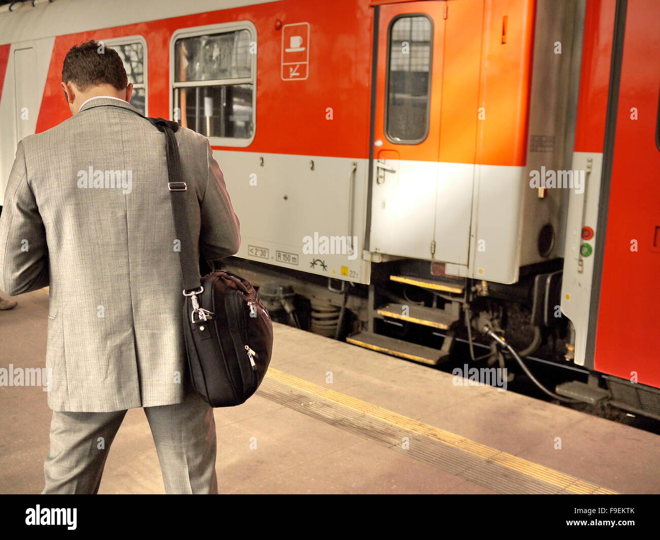 Man waiting for Train Stock Photo - Alamy