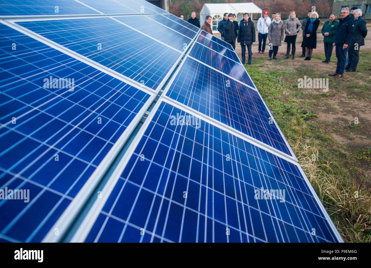 Guests of honour are at the opening of a new solar farm on a former ...