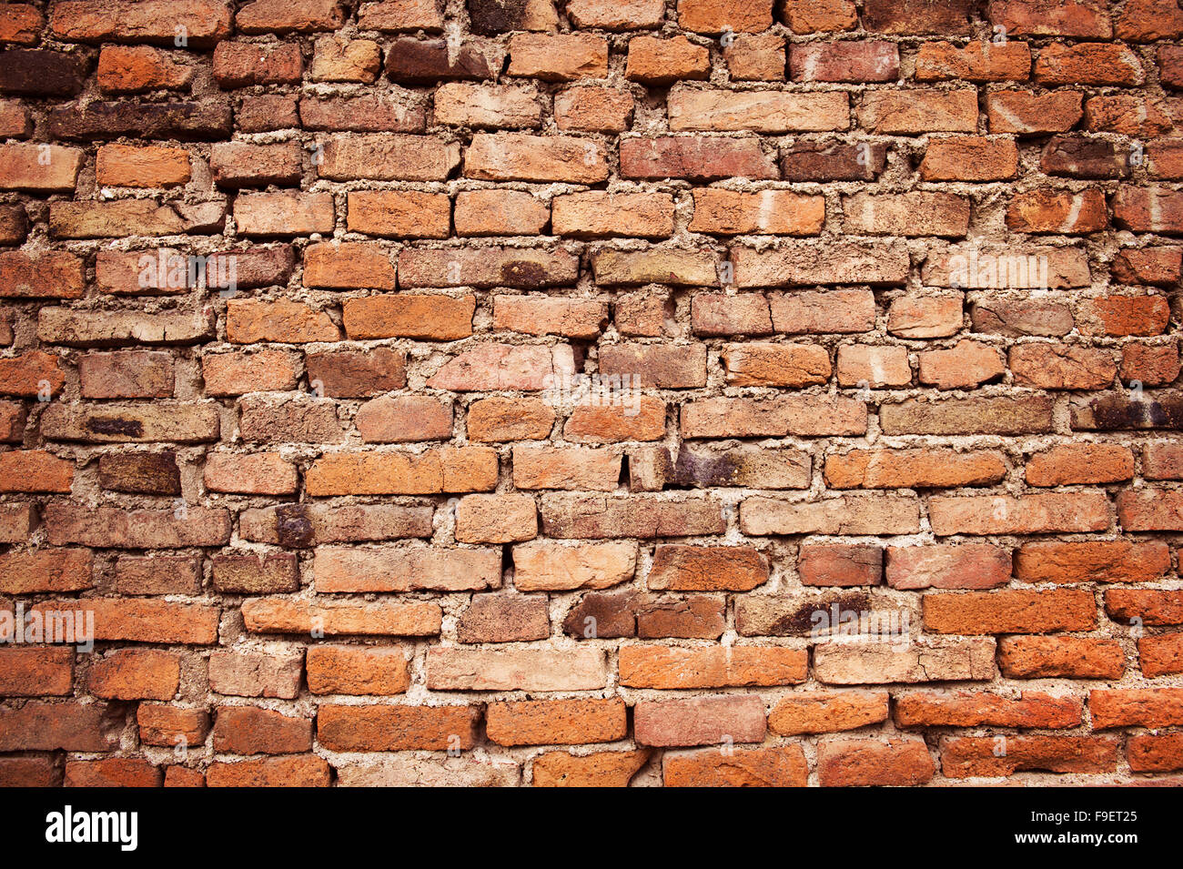Old empty brick wall background, plaster falling off Stock Photo - Alamy