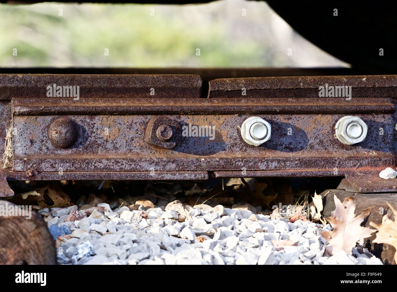 Beautiful pattern of the old and new nuts of the rusty railroad Stock ...