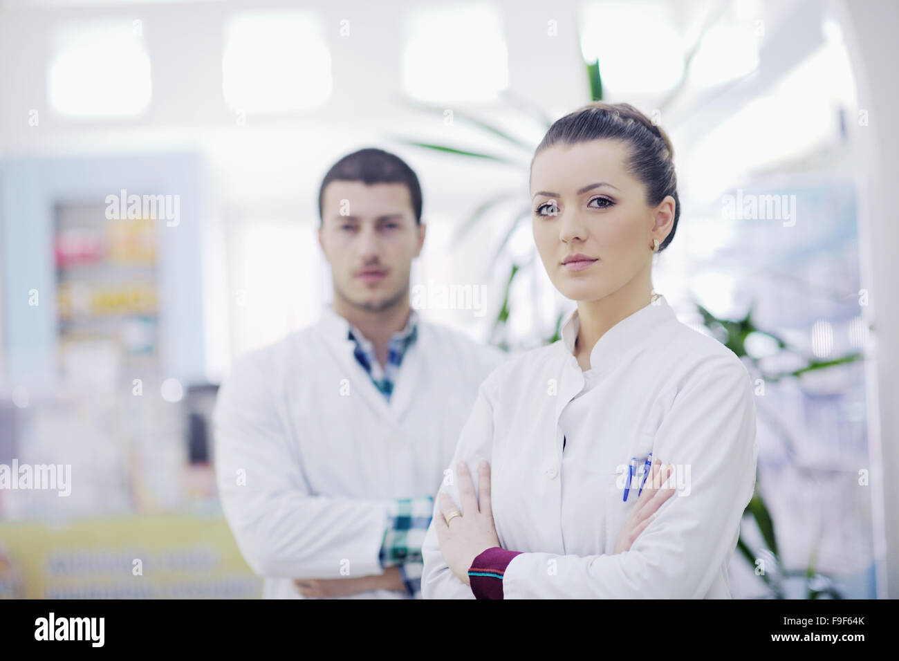 team of pharmacist chemist woman group standing in pharmacy drugstore ...