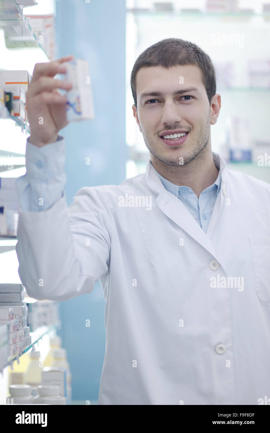 Portrait handsome young pharmacist chemist hi-res stock photography and ...