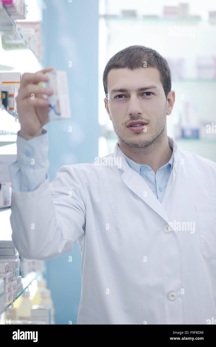 Portrait handsome young pharmacist chemist hi-res stock photography and ...