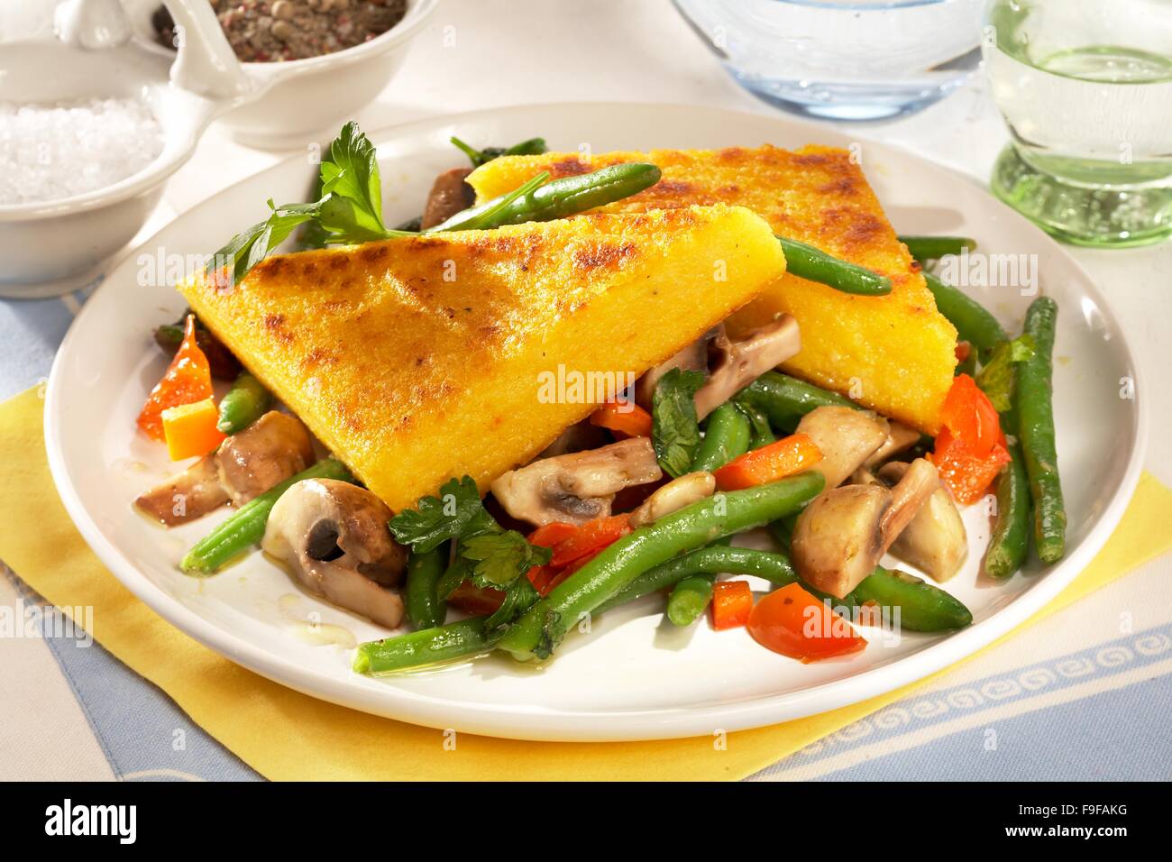 Polenta Triangles with Vegetable (step by step Stock Photo - Alamy