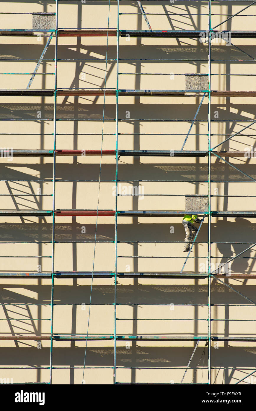 Scaffolding in front of house. Facade renovation Stock Photo - Alamy