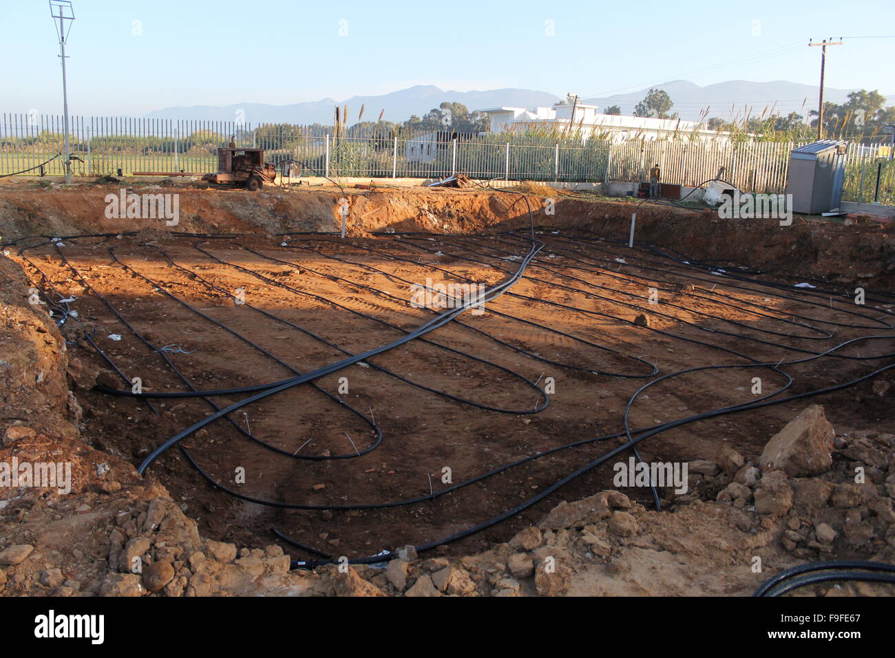 Horizontal geothermal piping installation for an industrial heat pump ...