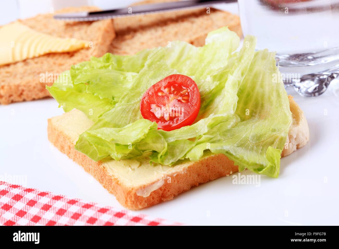 Slice of white bread and fresh lettuce Stock Photo - Alamy