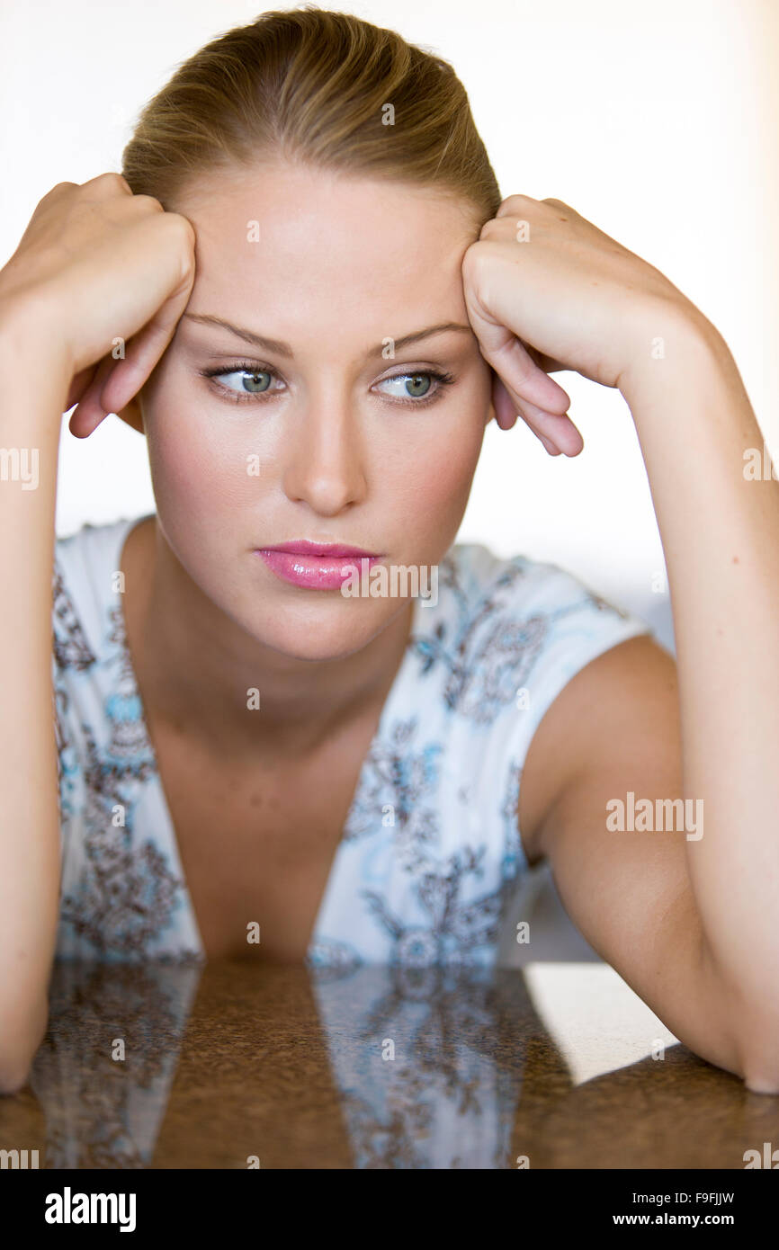 Thoughtful young woman Stock Photo - Alamy Thoughtful young woman Stock Photo - Alamy