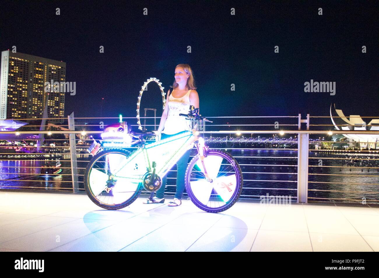 LED illuminating bicycle at Marina bay singapore. The cycle was self ...