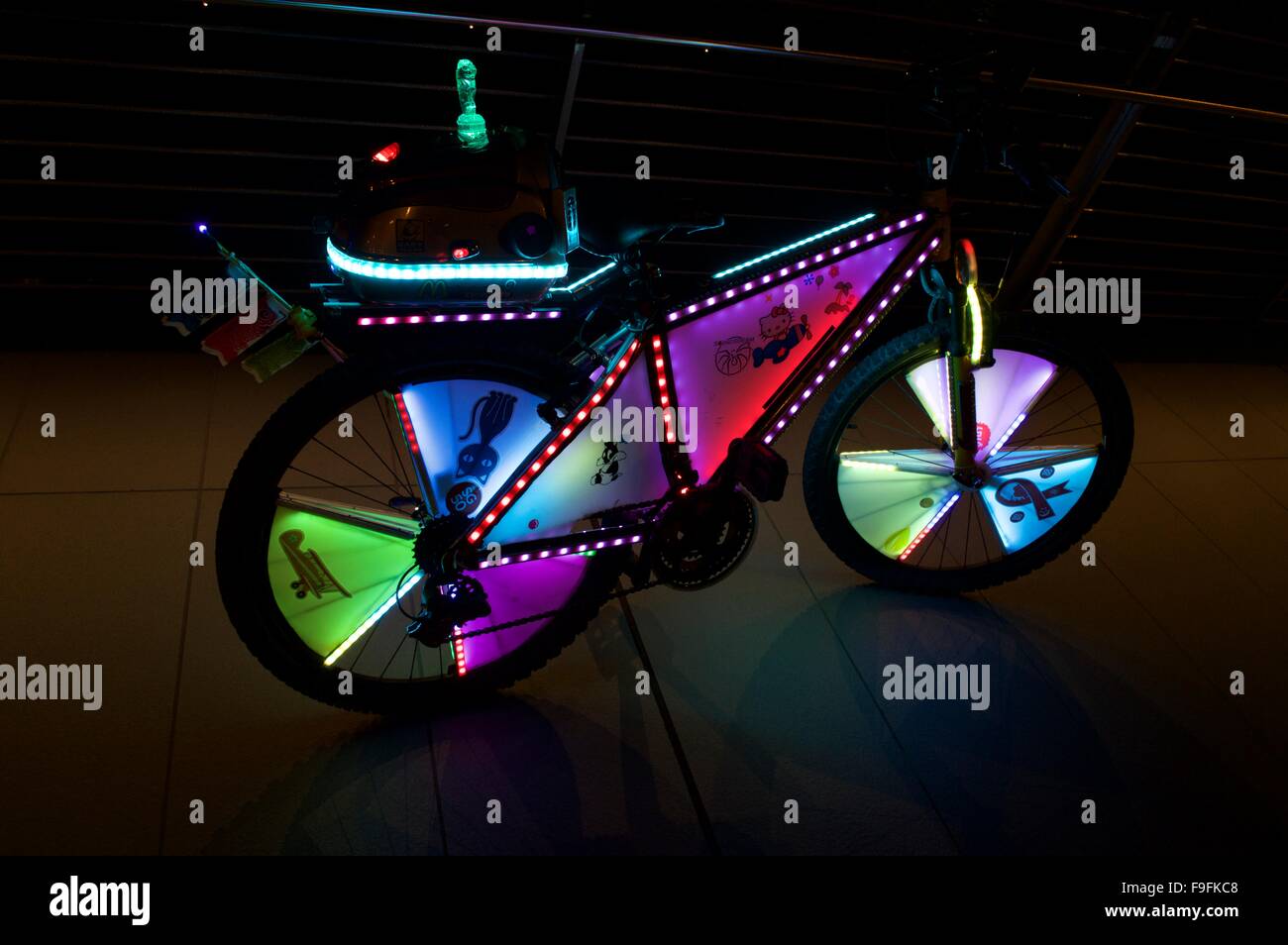 LED illuminating bicycle at Marina bay singapore. The cycle was self ...