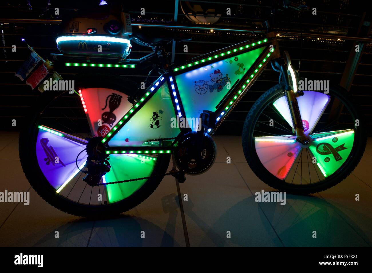 LED illuminating bicycle at Marina bay singapore. The cycle was self ...