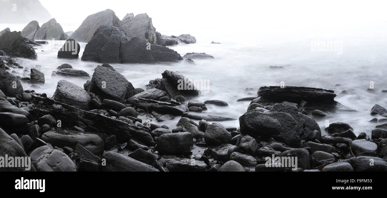 Landscape of rocks and water on the coast of Basque Country Stock Photo ...