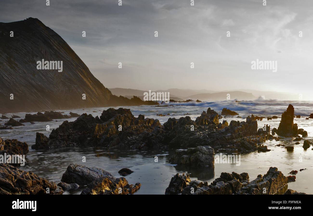 Landscape of rocks and water on the coast of Basque Country Stock Photo ...