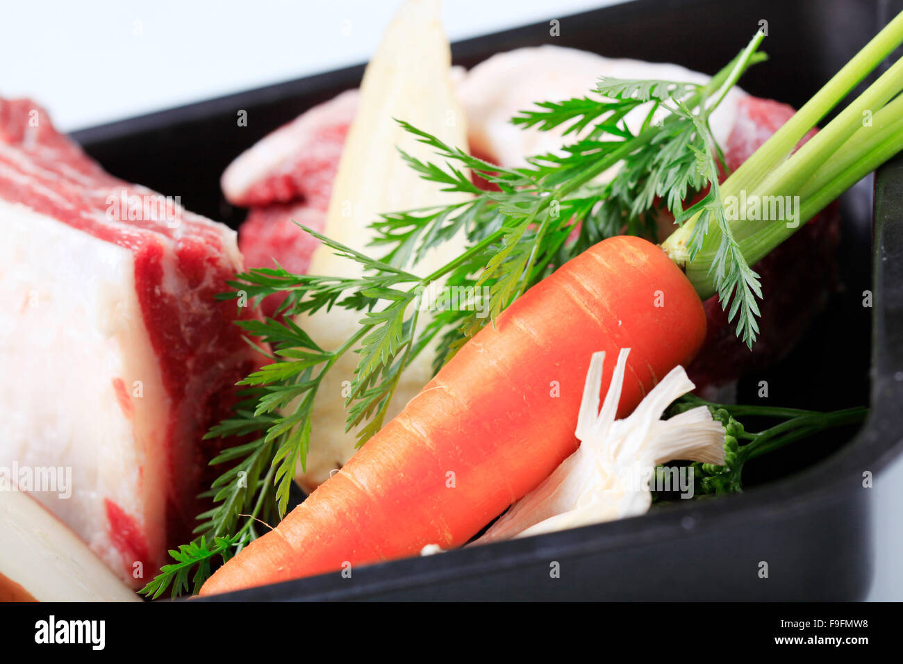 Raw meat and vegetables Stock Photo - Alamy