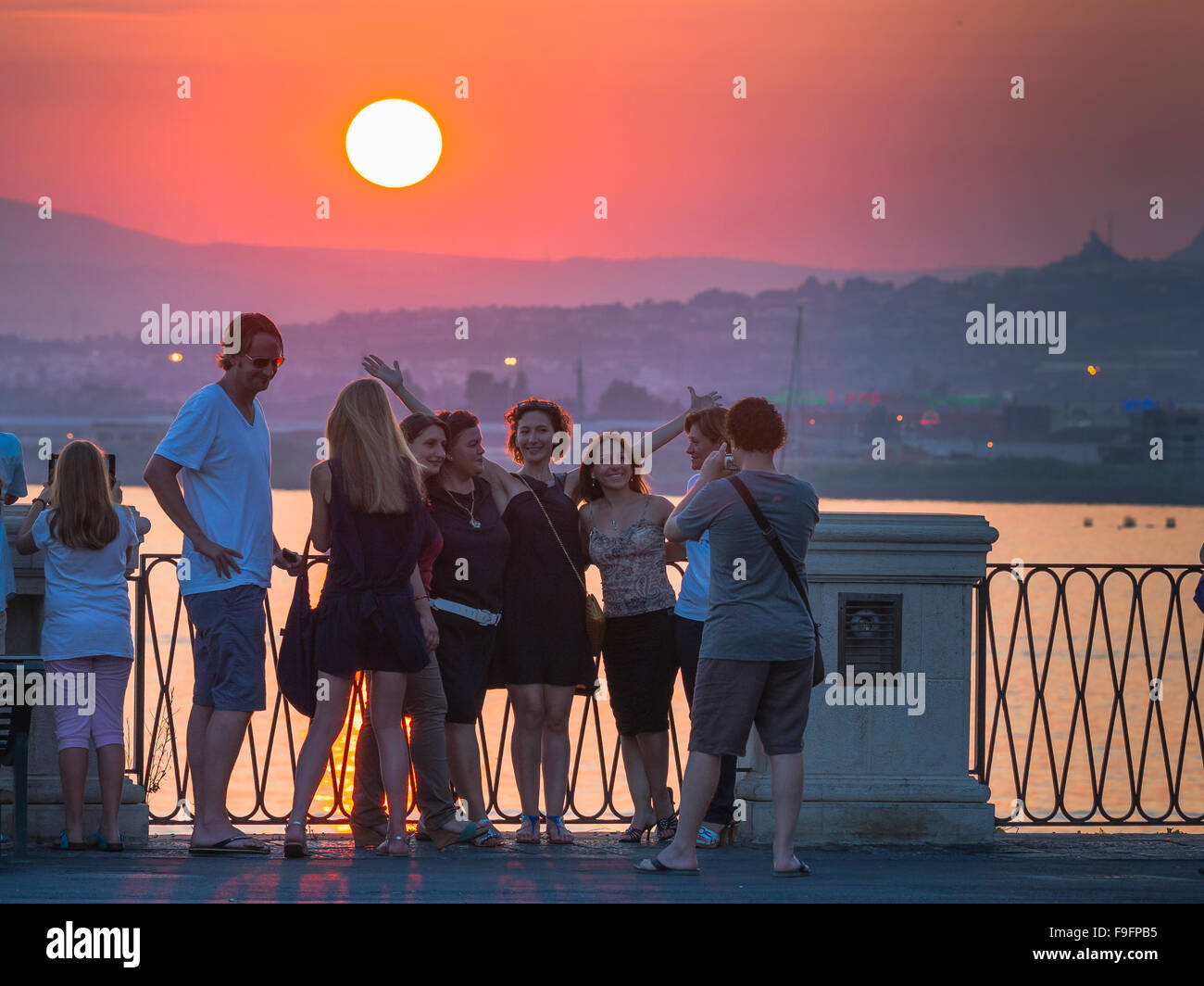 Celebrating the sunset hi-res stock photography and images - Alamy