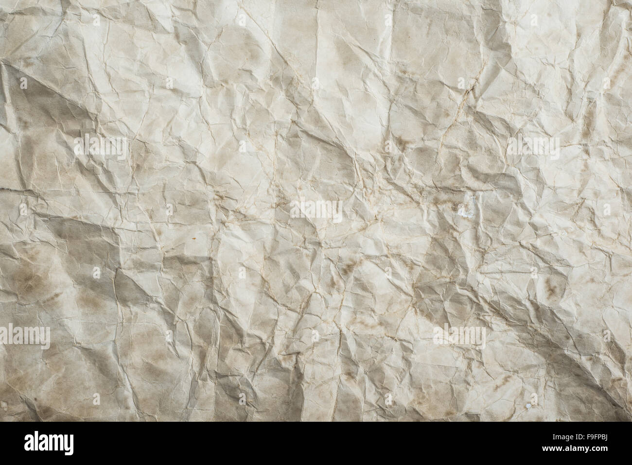 Piece of old rumpled stained paper as background Stock Photo - Alamy