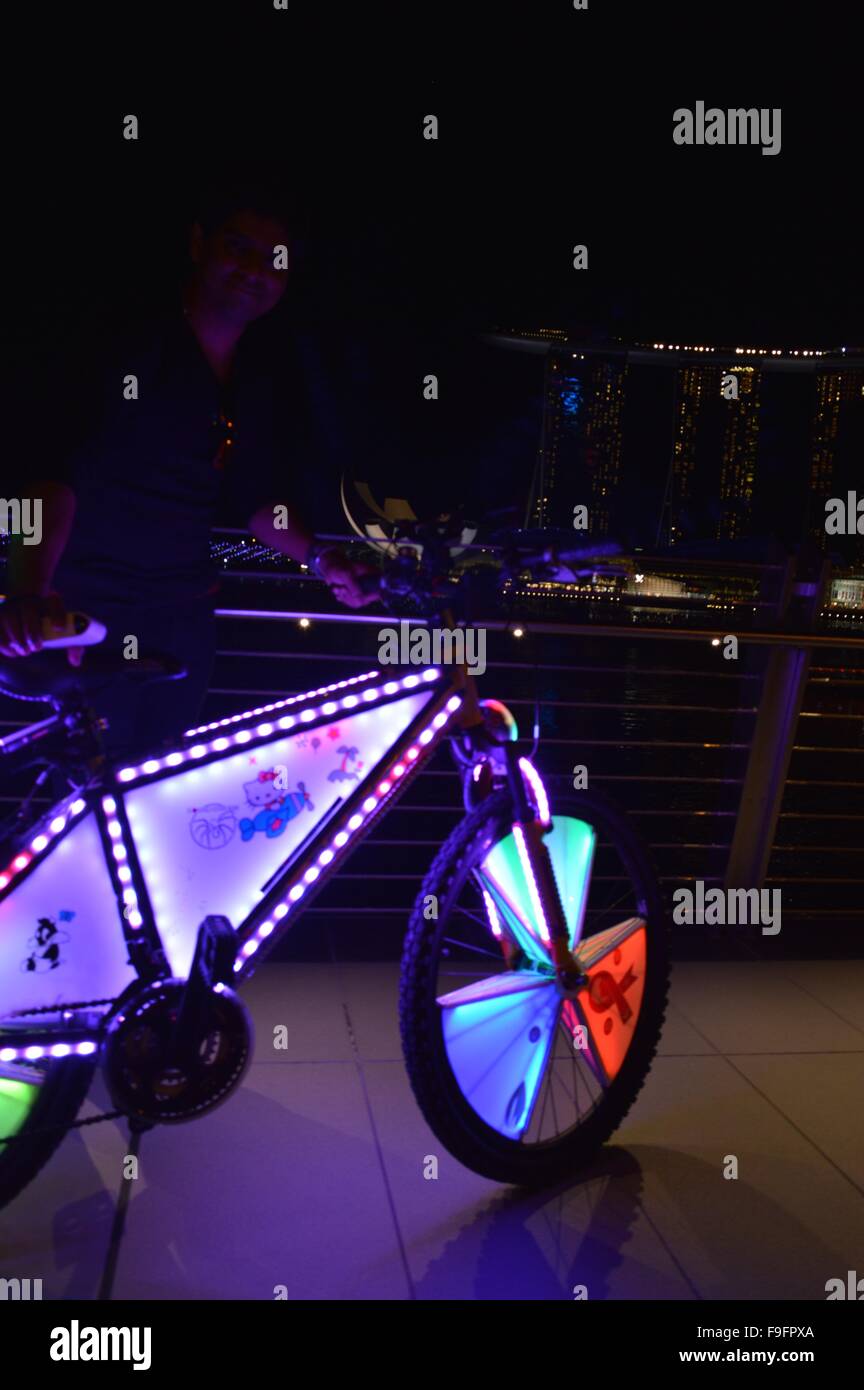 LED illuminating bicycle at Marina bay singapore. The cycle was self ...