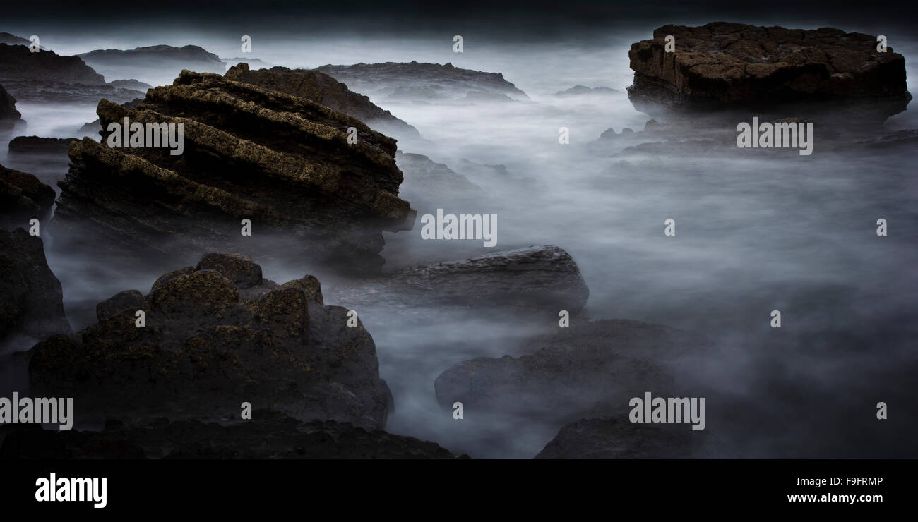 Landscape of rocks and water on the coast of Basque Country Stock Photo ...