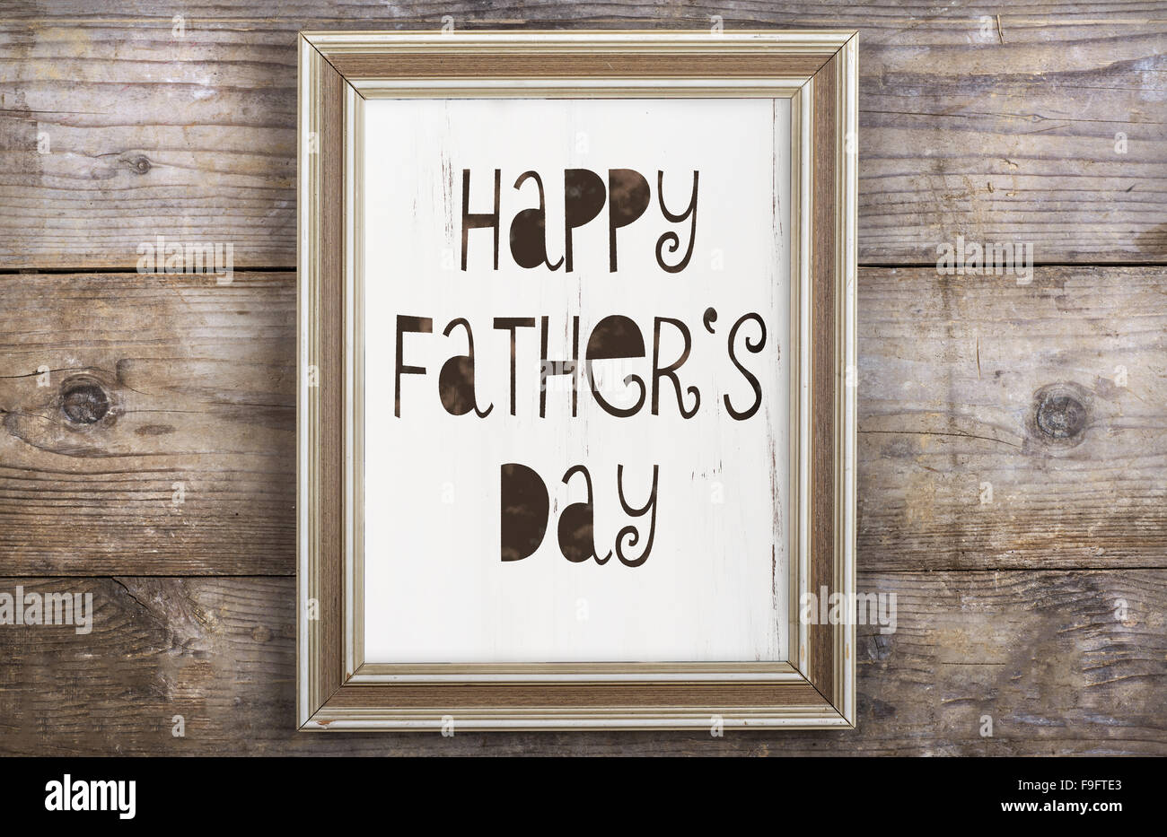 Rectangle picture frame with Happy fathers day sign laid on wooden ...