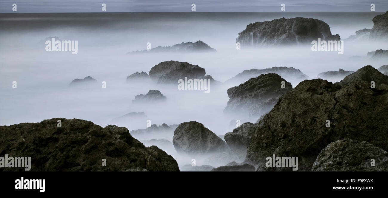 Fog and rocks Stock Photo - Alamy