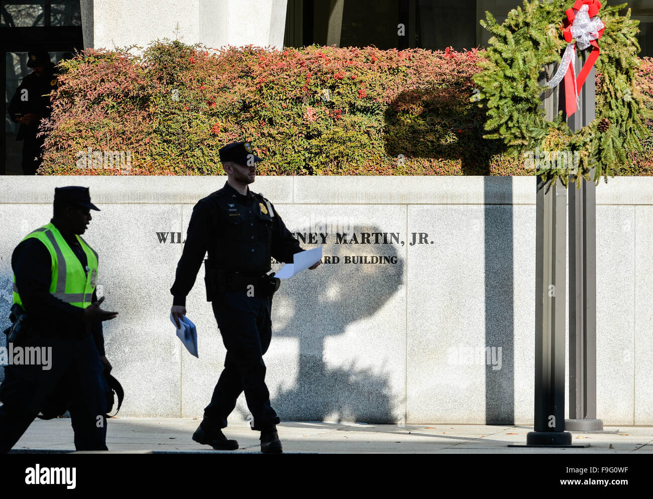 Washington, DC, USA. 16th Dec, 2015. People walk past the U.S. Federal ...