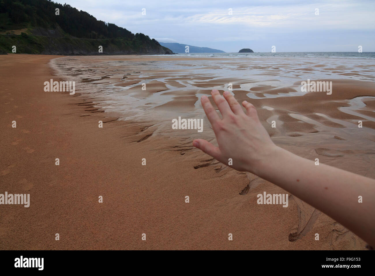 Hand on the beach Stock Photo - Alamy