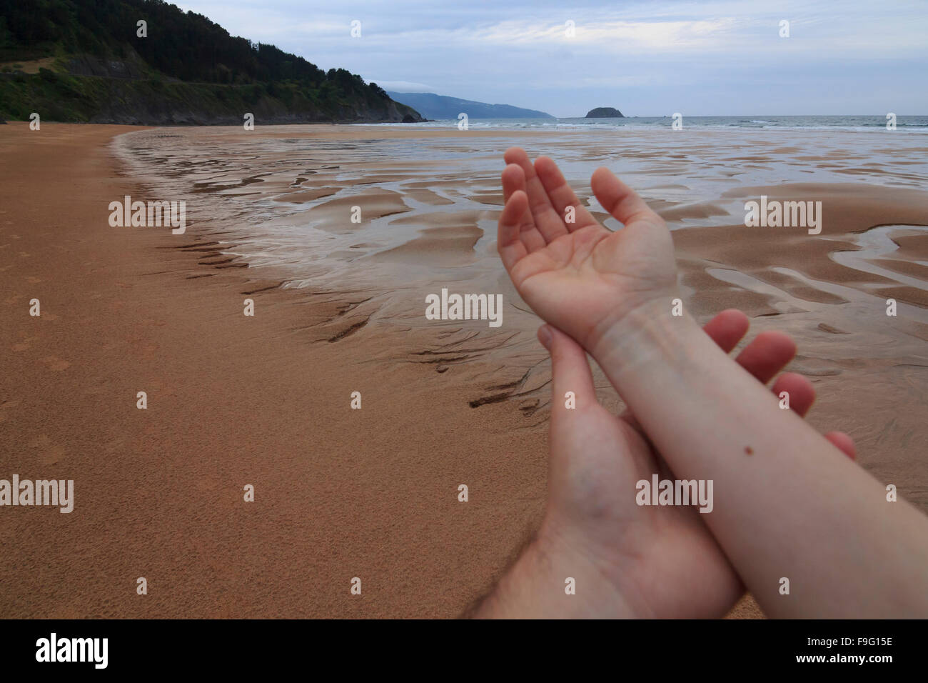 Hand on the beach Stock Photo - Alamy