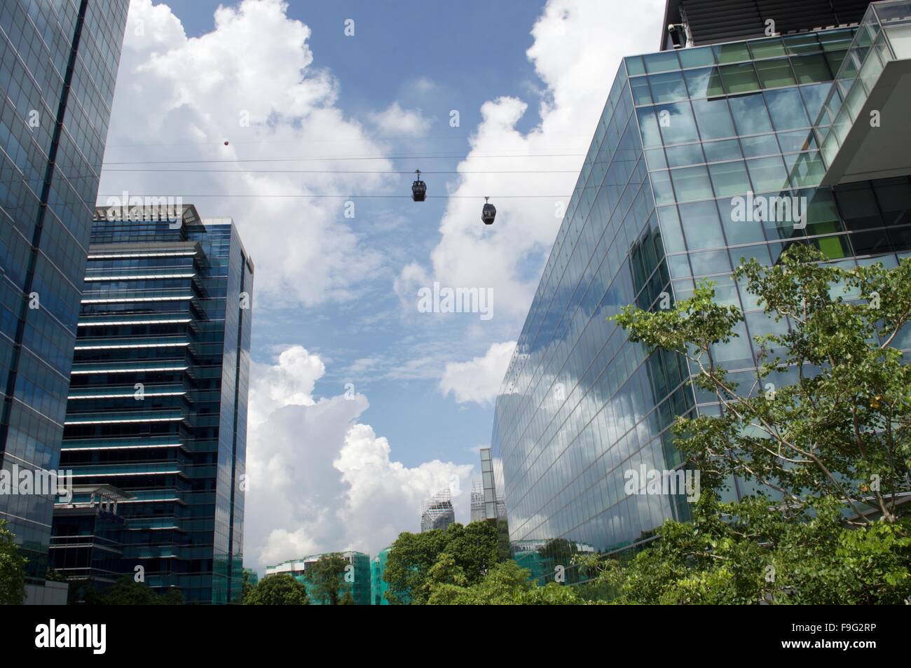 a rope-way and highrise skyscrapers near santosa island in singapore ...