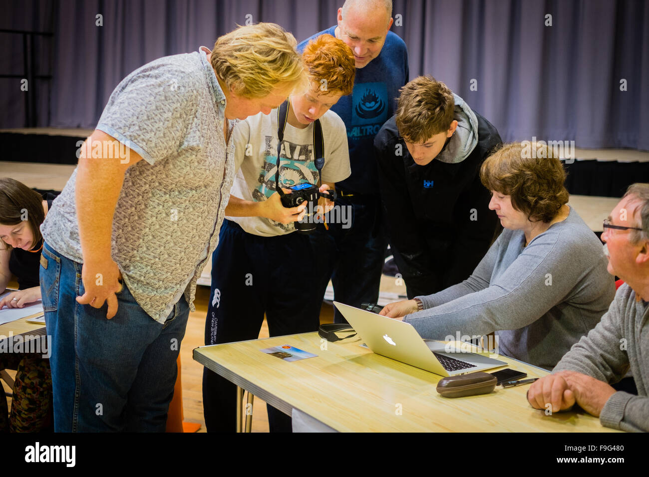 People, amateur and hobbyist photographers, preparing to take part in ...