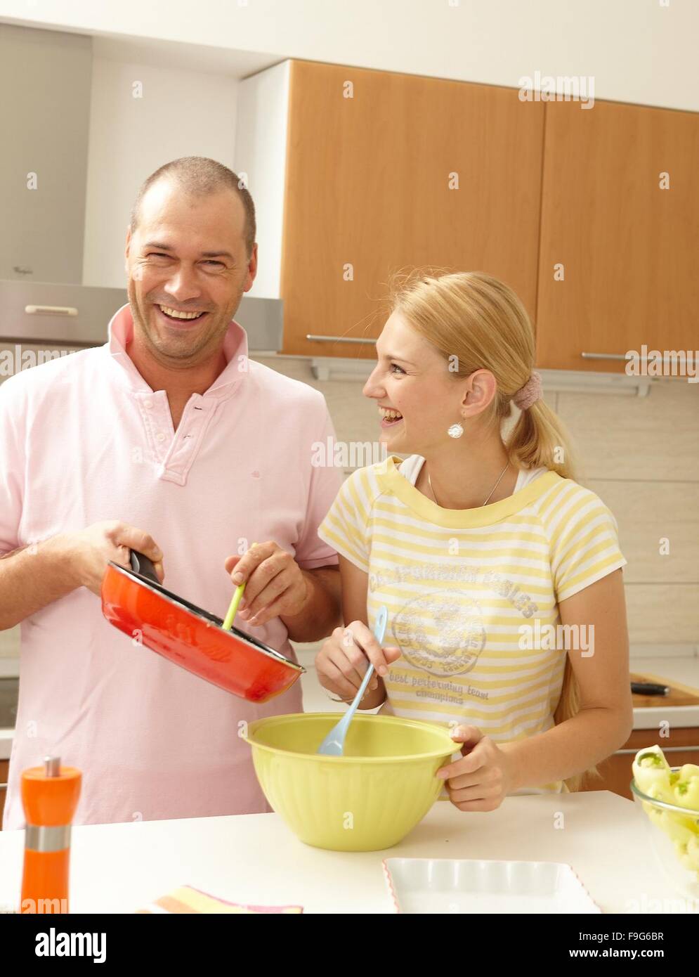 Man and Woman Cooking Stock Photo - Alamy