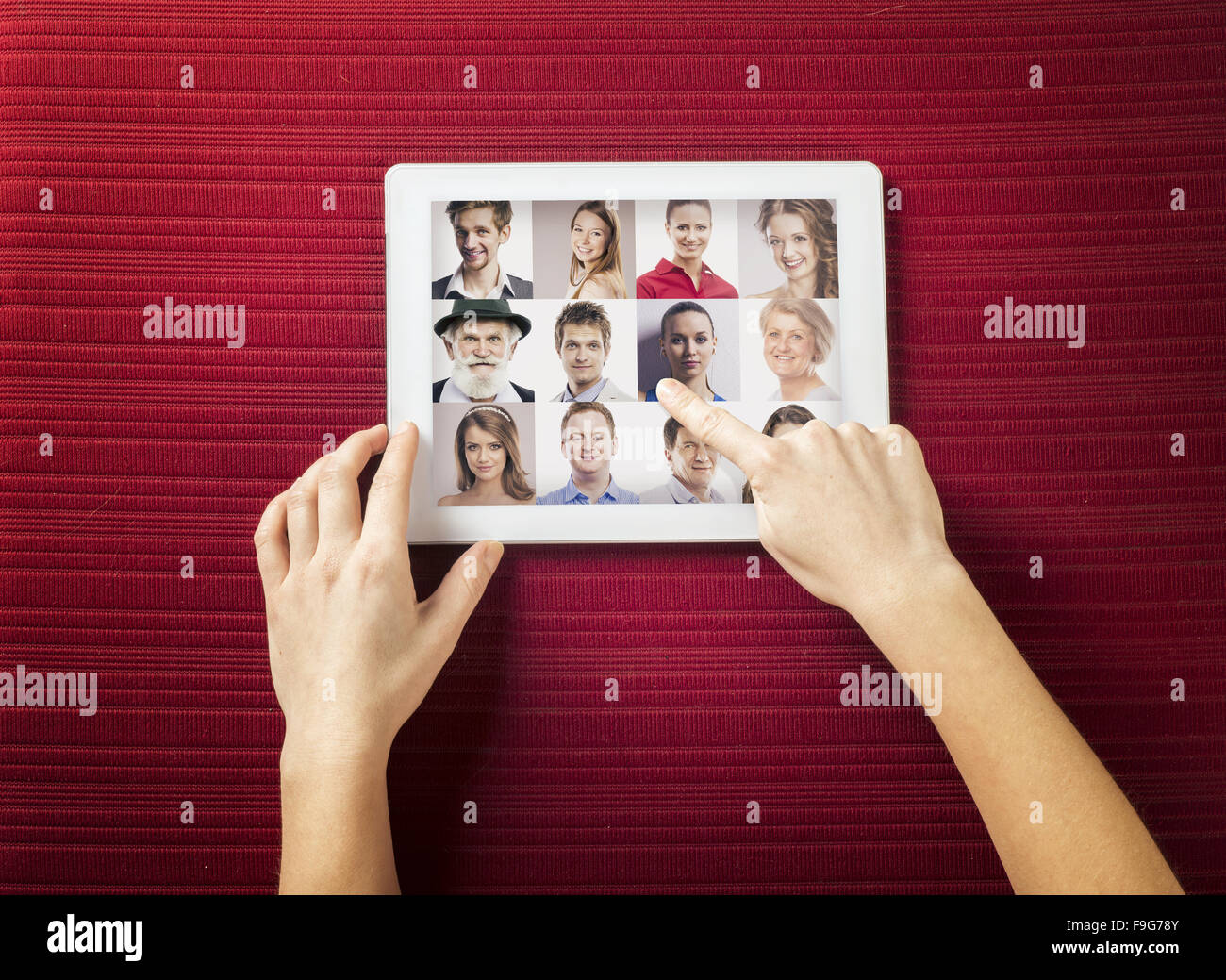 Female hands holding a tablet with isolated screen Stock Photo - Alamy