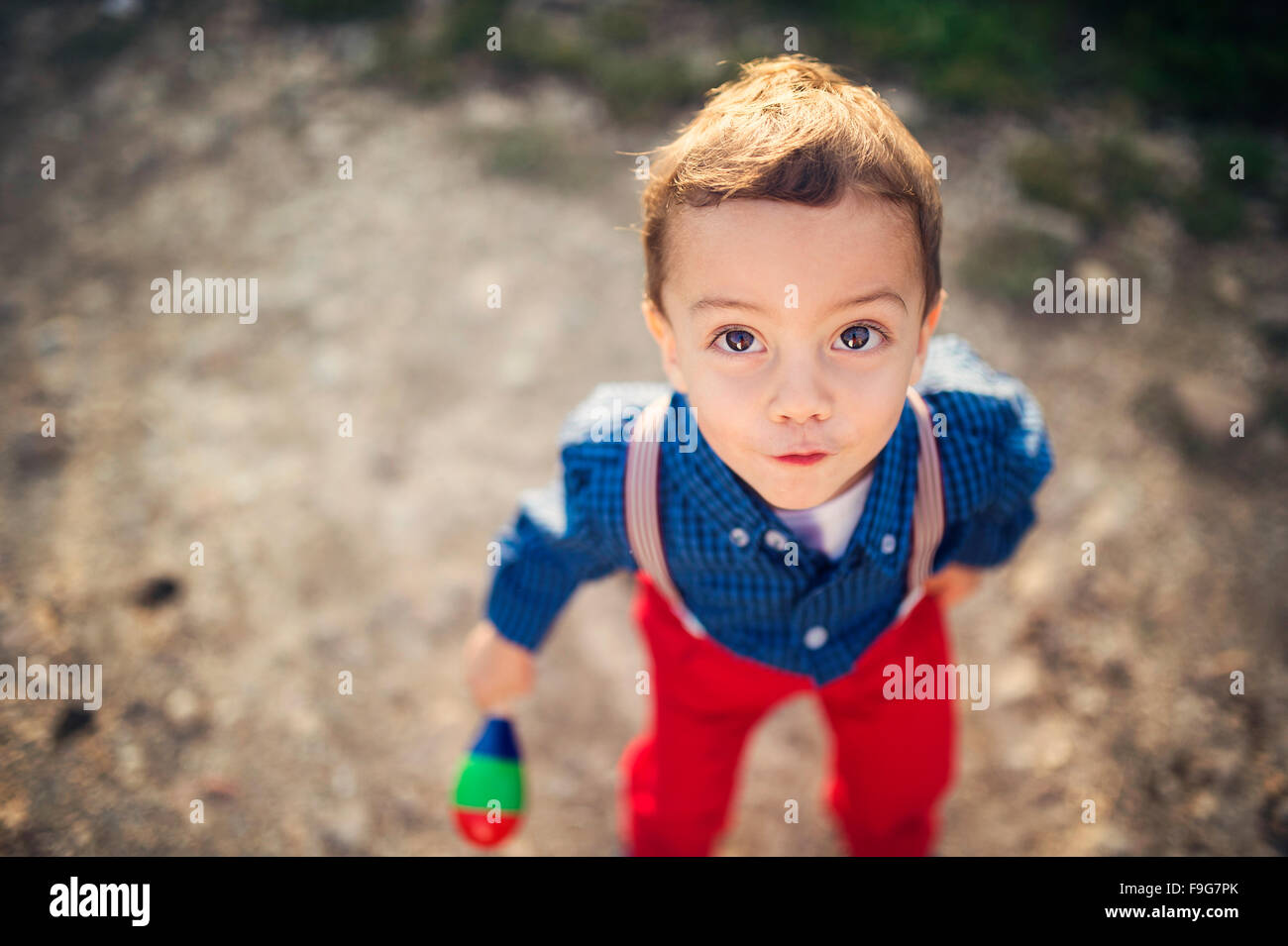 Cute little boy having fun outside in summer nature Stock Photo - Alamy