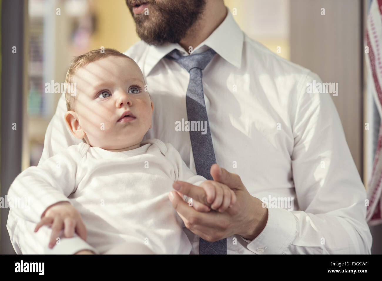 Young father with his cute little baby daughter Stock Photo - Alamy