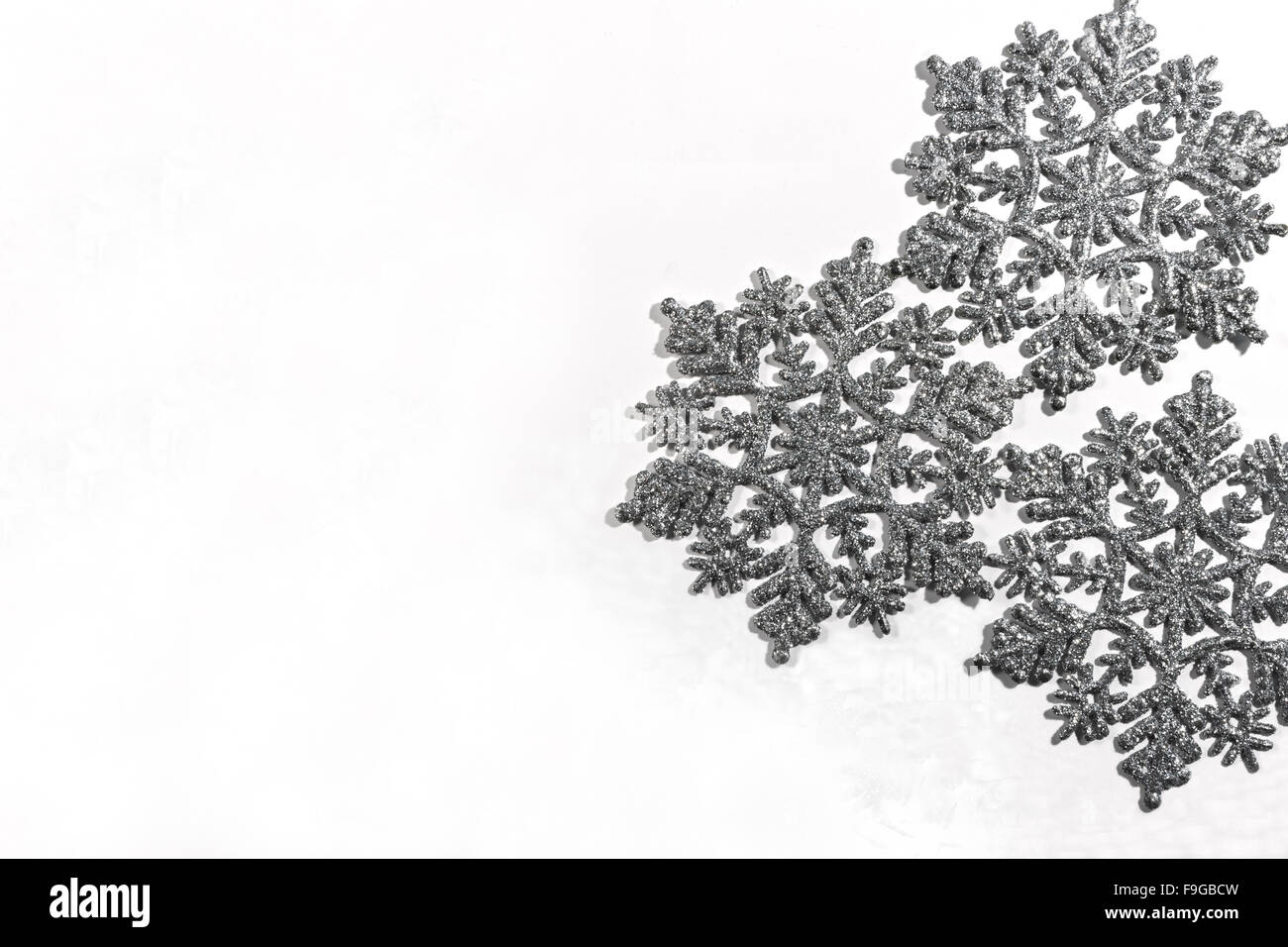 Shiny silver snowflakes on white background, winter holidays Stock ...