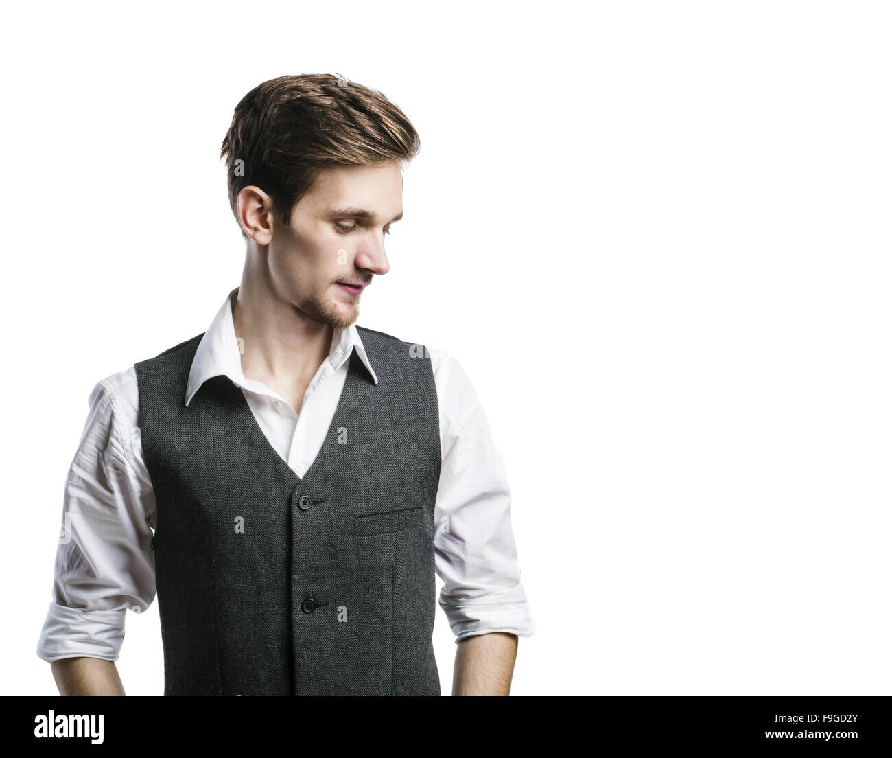 Stylish handsome young man posing. Studio shot on white background ...