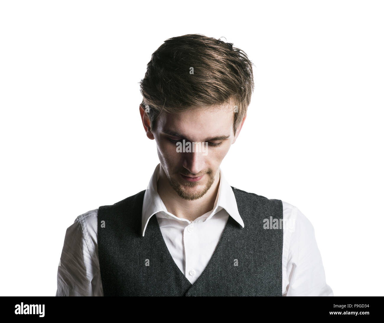 Stylish handsome young man posing. Studio shot on white background ...