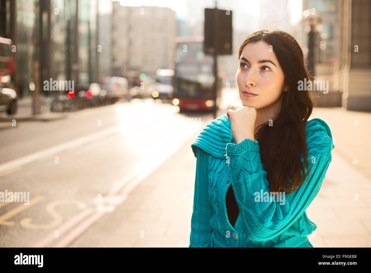 young woman with a serious expression Stock Photo - Alamy